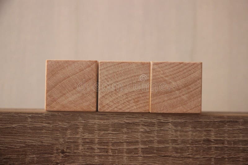 Three Blank Wooden Blocks on Wooden Table. Education Concept Stock ...
