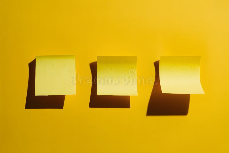 Three Blank Yellow Post it Notes on Yellow Background, Varied Angles ...