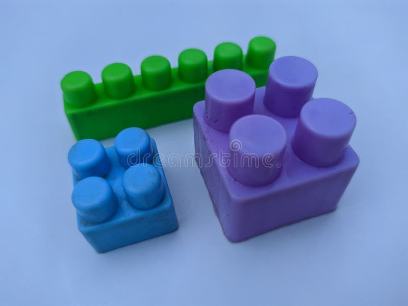 Three Blocks of Lego Children S Toys Stock Image - Image of pink ...