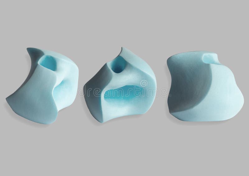 Blue Abstract Objects Floating in the Air on a Light Gray Background ...