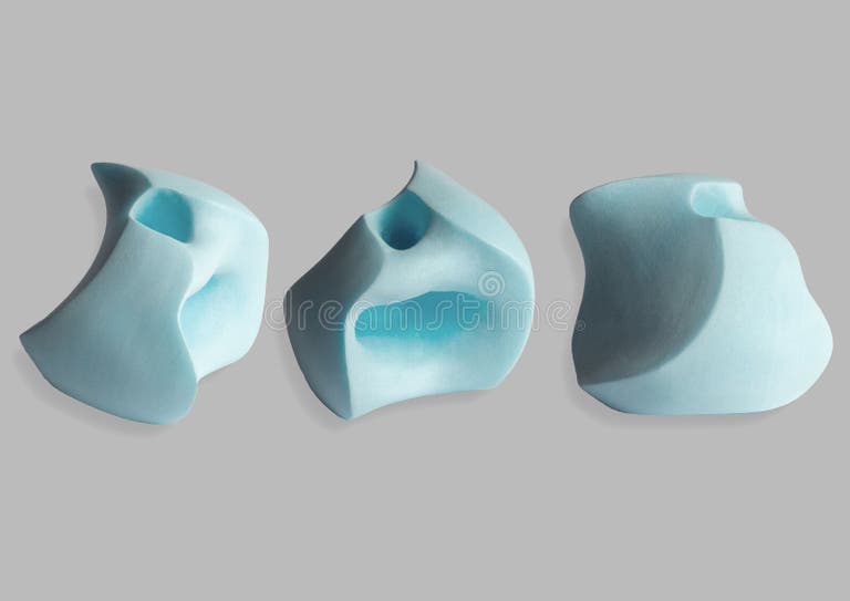 Blue Abstract Objects Floating in the Air on a Light Gray Background ...