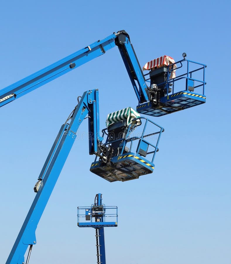 Three Blue Aerial Working Platforms Cherry Picker Stock Photos - Free ...