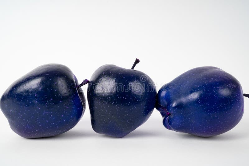 Three Blue Apples on a White Background Stock Photo - Image of group ...