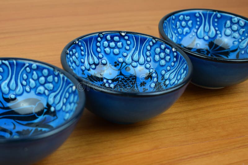Three blue bowls stock photo. Image of blue, lighting - 268109134