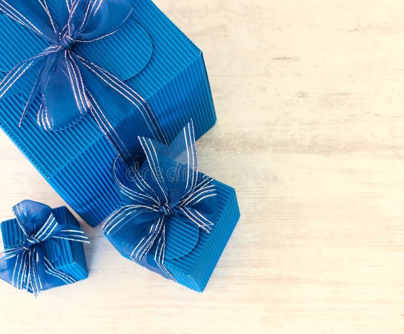 Three Blue Carton Gift Boxes Stock Image - Image of defocused, blue ...
