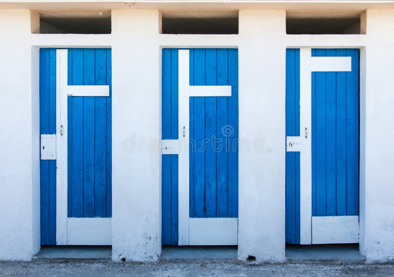 Three blue doors stock photo. Image of cubicle, next - 61017464