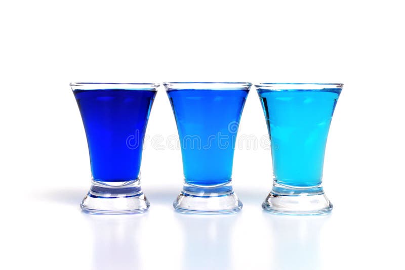 Three blue liquid shots stock photo. Image of blue, liquid - 242363924