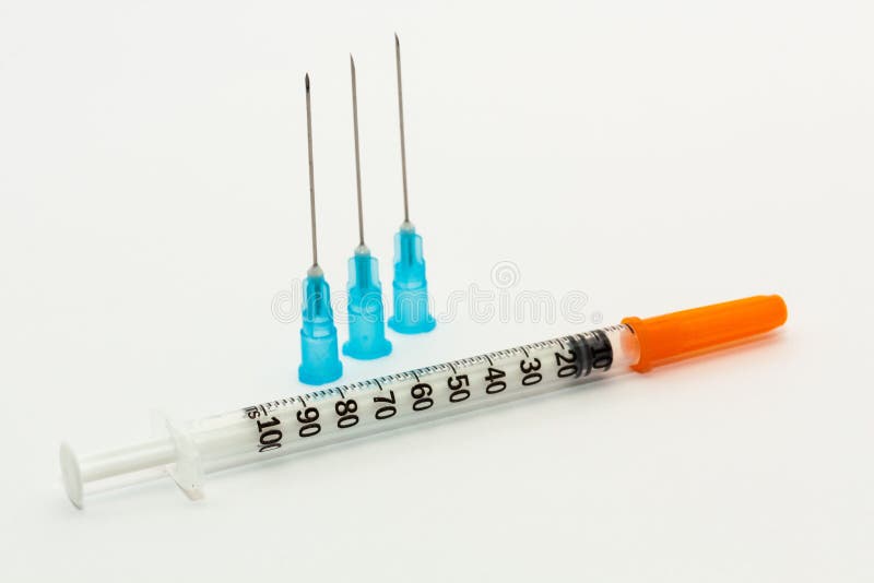 Three Blue Needles and One 1ml Disposable Plastic Syringe Stock Photo ...