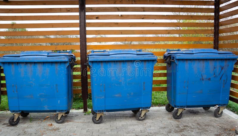 Three Blue Plastic Garbage Containers Stock Image - Image of plastic ...