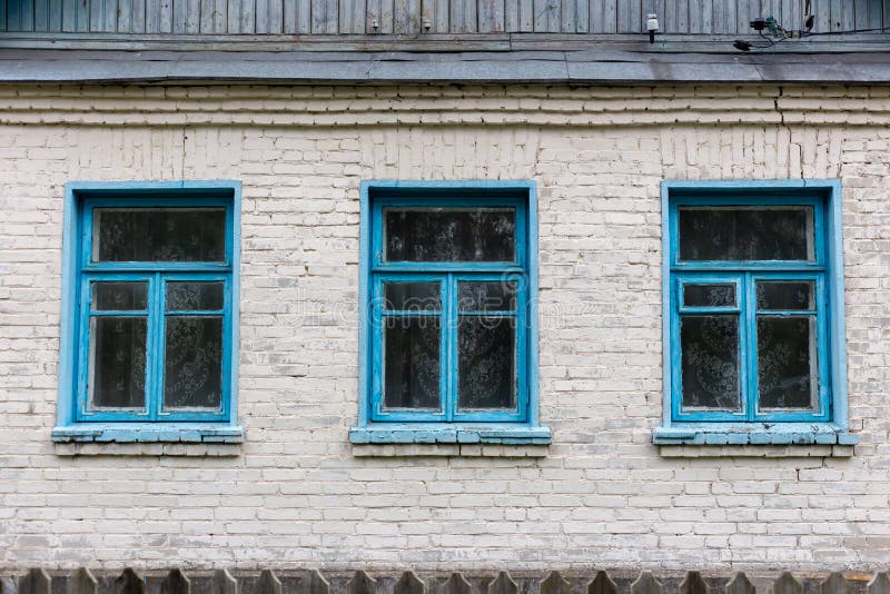 Three Blue Windows in a Brick House Stock Image - Image of ancient ...