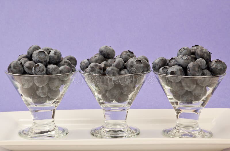 Three Blueberry Cups stock image. Image of taste, delicate - 24014571