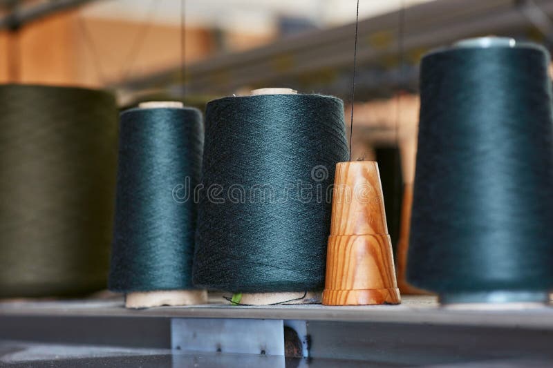 Three Bobbins with Industrial Threads on Cones Stock Photo - Image of ...