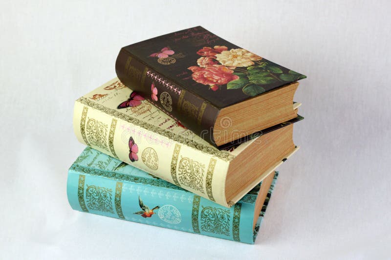 Three Book Boxes Featuring a Floral Pattern on the Front Cover Stock ...