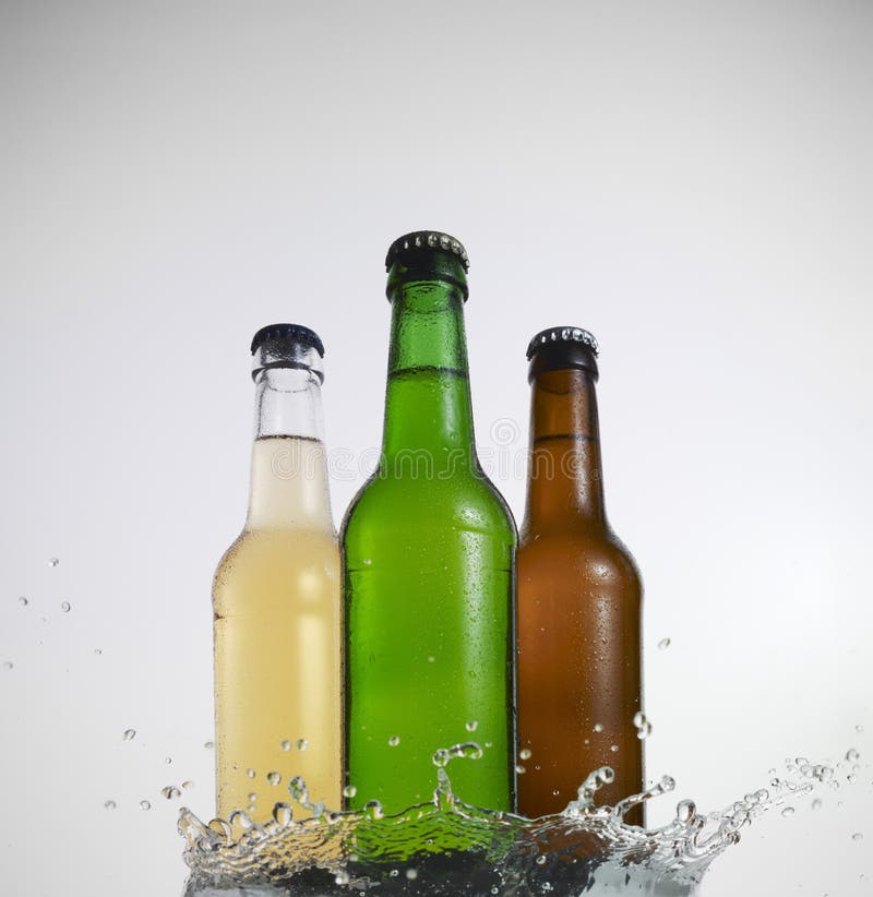 Three Bottles stock photo. Image of beverage, splash - 12752038