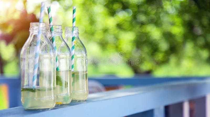 Three Bottles with Lemonade. Stock Photo - Image of lemon, heat: 149205640