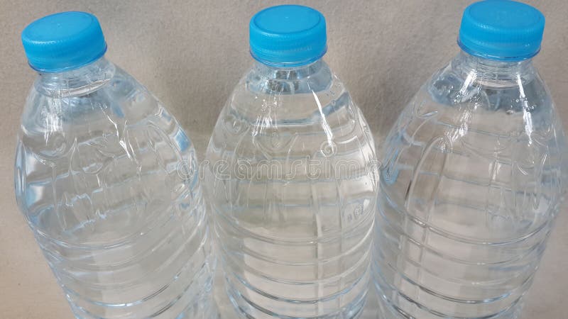 Three Water Bottles stock image. Image of transparent - 25569167