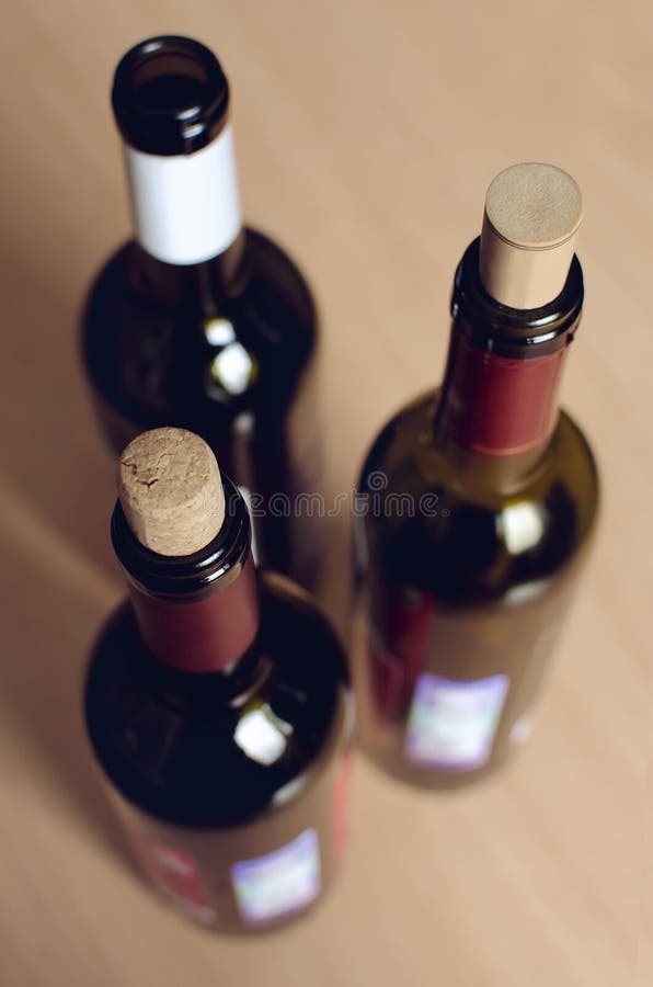 Three Bottles of Wine at Home. Vertical Photo Stock Image - Image of ...