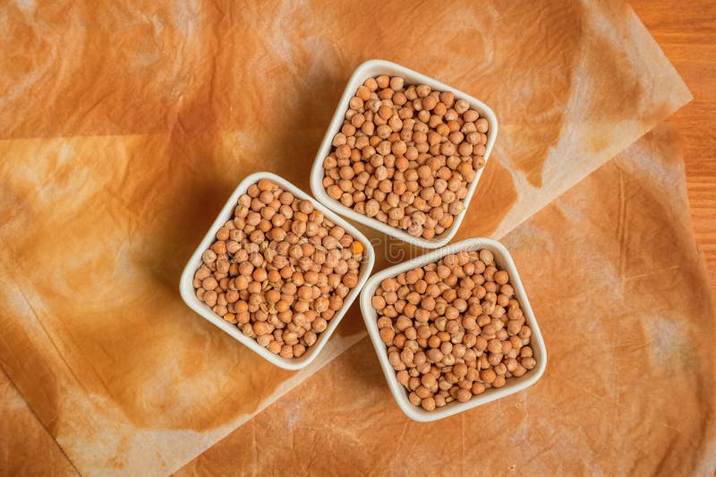 Three Bowls of Chickpeas with Burned Baking Paper, Top View Stock Image ...