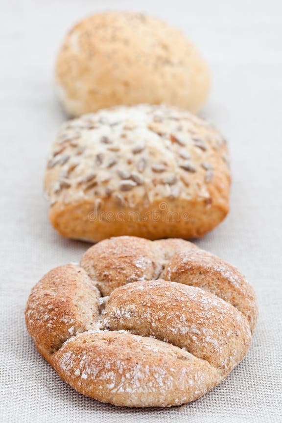 Three bread buns in a row stock image. Image of hessian - 13457529