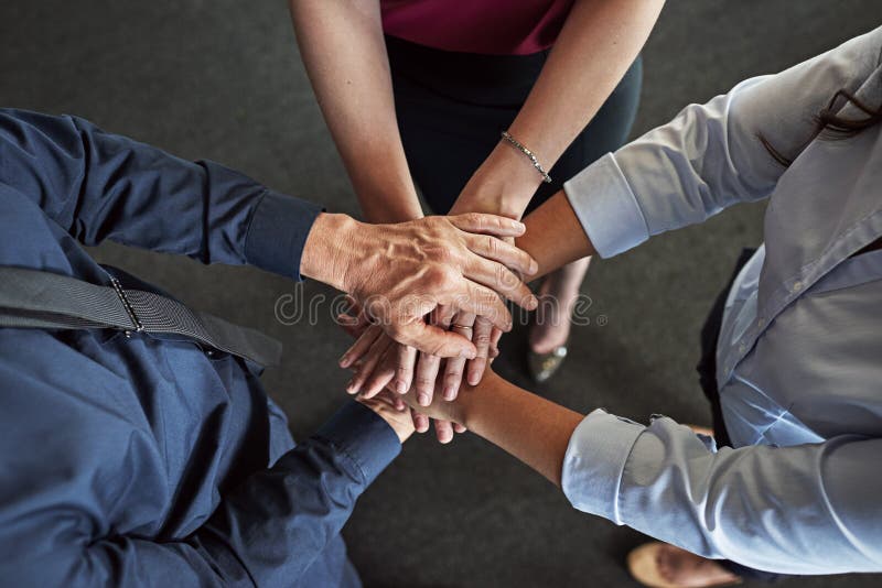 On Three...break. High Angle Shot of a Group of Businesspeoples Hands ...