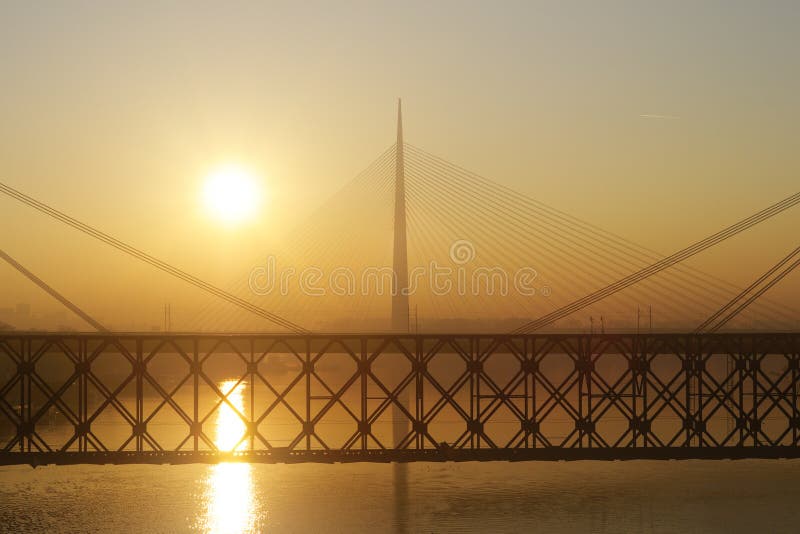 Three bridges at sunset stock image. Image of cityscape - 44837851