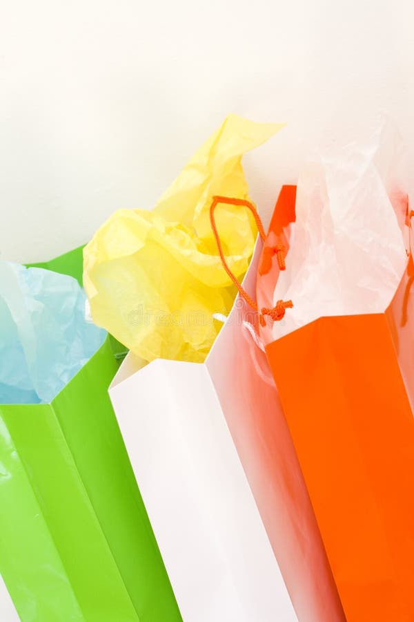 Three Bright Colored Gift Bags Stock Image - Image of still, spend ...