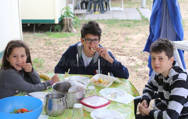Three Brothers To Dinner on the Table in the Bungalow Stock Photo ...