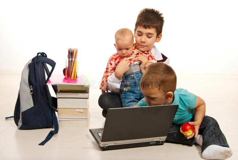 Three Brothers Using Laptop Stock Photo - Image of home, little: 27545576