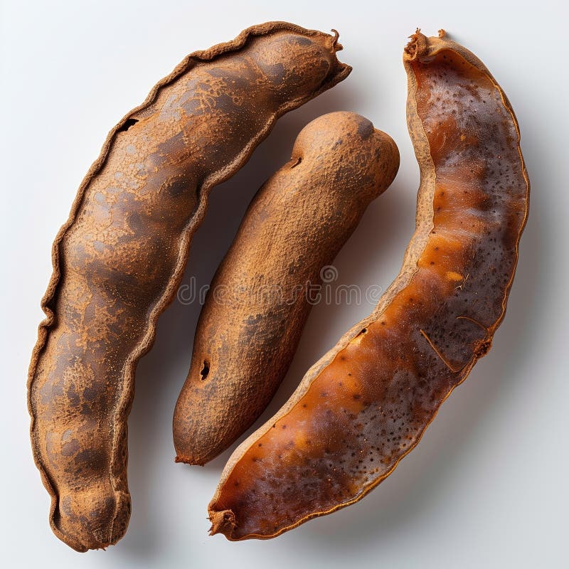 Three Brown Tamarind Pods on a White Surface Stock Photo - Image of ...