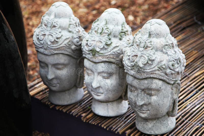 Three Buddha Statue Sitting on a Wall Stock Photo - Image of landmark ...