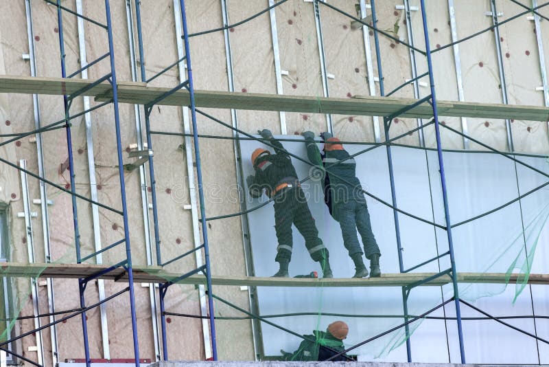 Three Builders Build the House Stock Image - Image of home, equipment ...