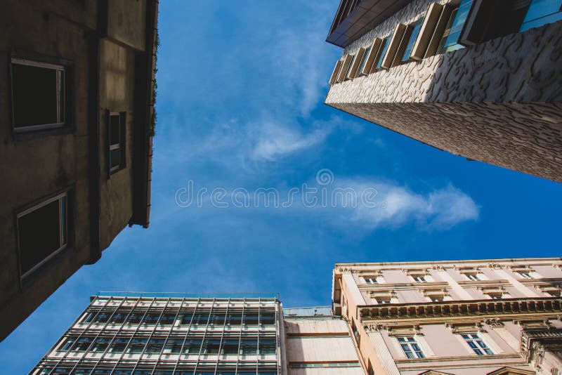 Three buildings and sky stock photo. Image of progress - 189611480