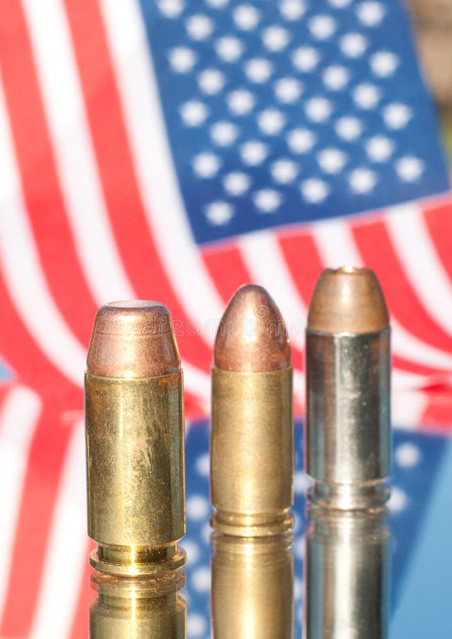 Bullets and US Flag stock image. Image of destruction - 15584801