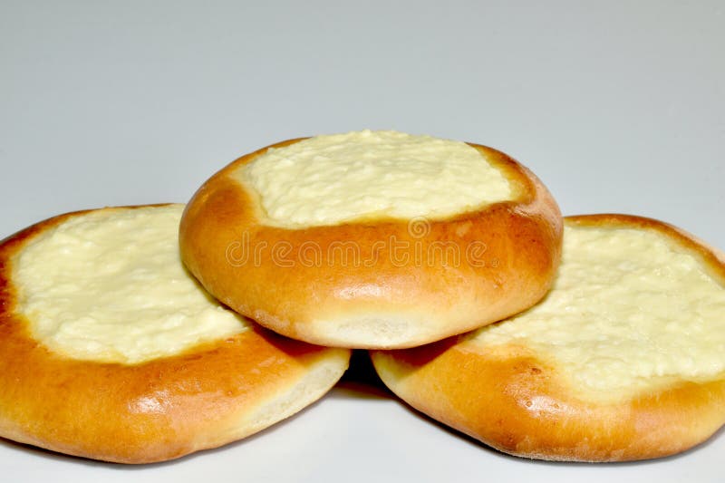 Three Buns with Cottage Cheese Lie on Top of Each Other. Stock Photo ...