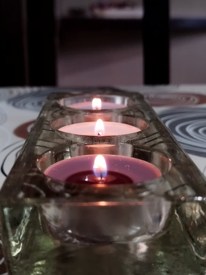Three Burning Scented Candles on the Table Stock Image - Image of organ ...