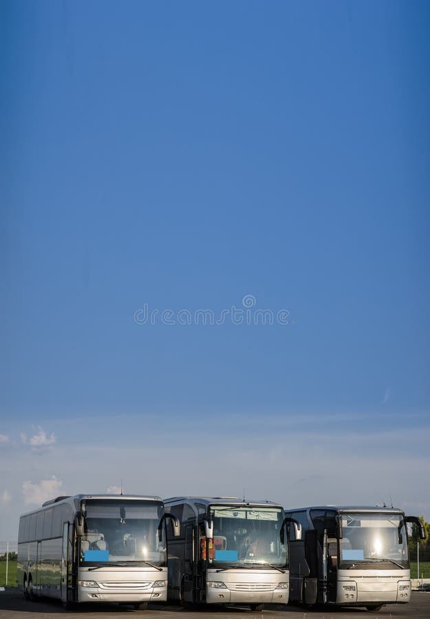 Three Buses Staying in the Parking Lot Front Way Stock Photo - Image of ...