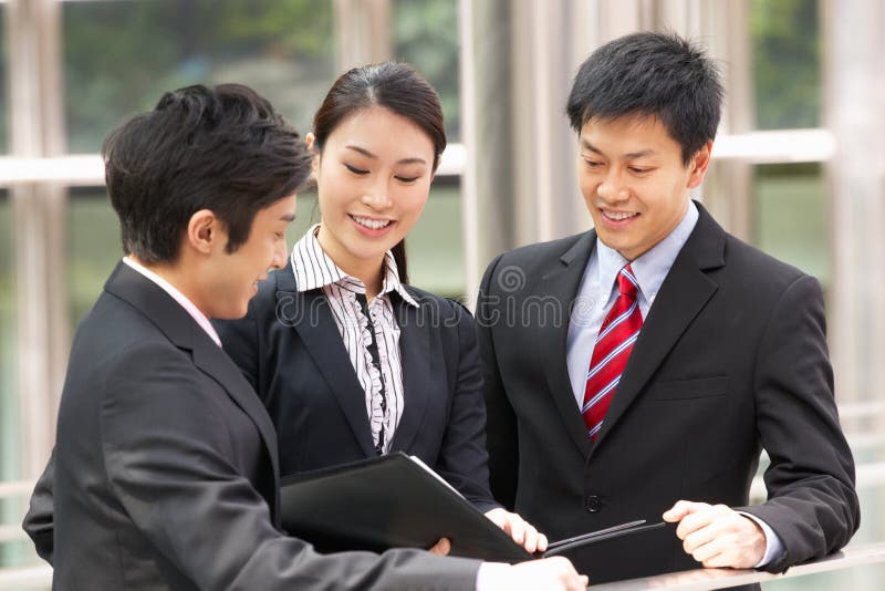 Colleagues Discussing Strategy on Whiteboard Stock Photo - Image of ...