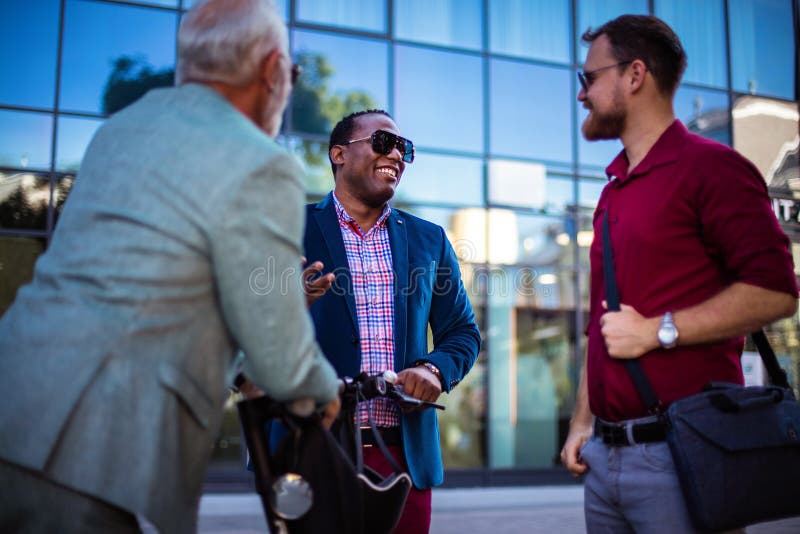 Business Men Standing Outside And Having Meeting On Mobile Phone. Focus ...