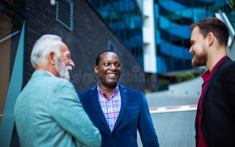 Three business men talking stock image. Image of outdoors - 219264695