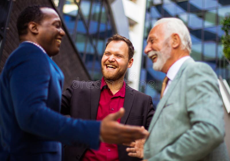 Three business men talking stock image. Image of american - 222043183