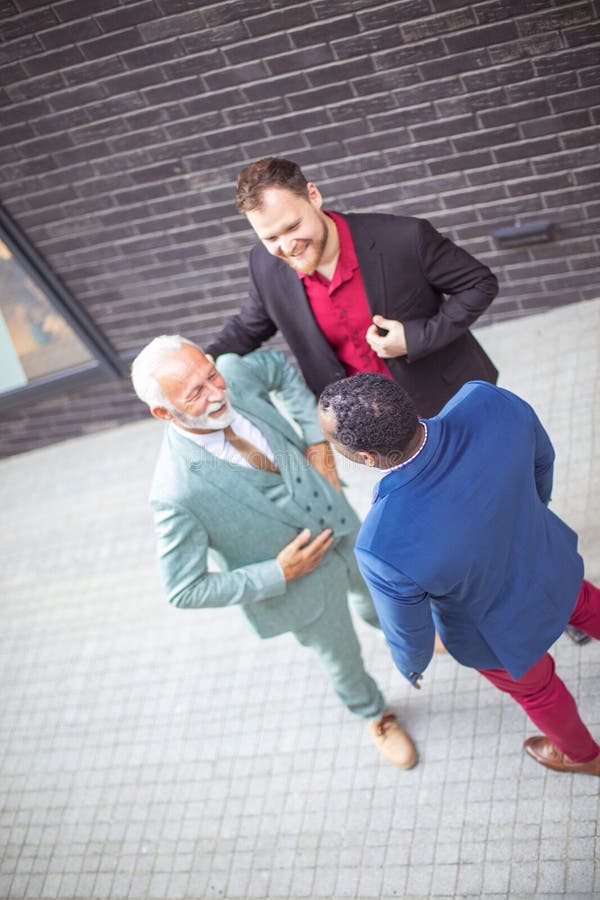 Three Business Men Talking. Stock Photo - Image of confidence ...