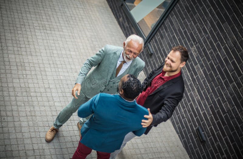 Three business men talking stock image. Image of american - 222043183