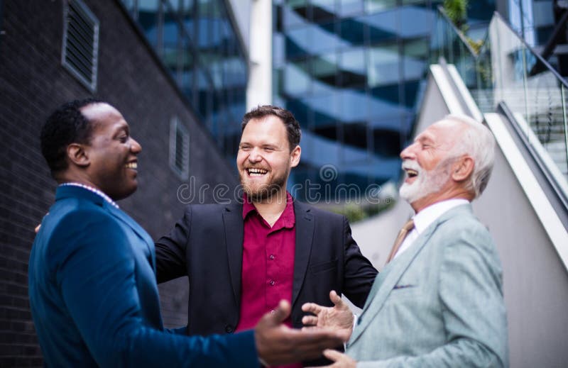 Three business men talking stock image. Image of american - 222043183
