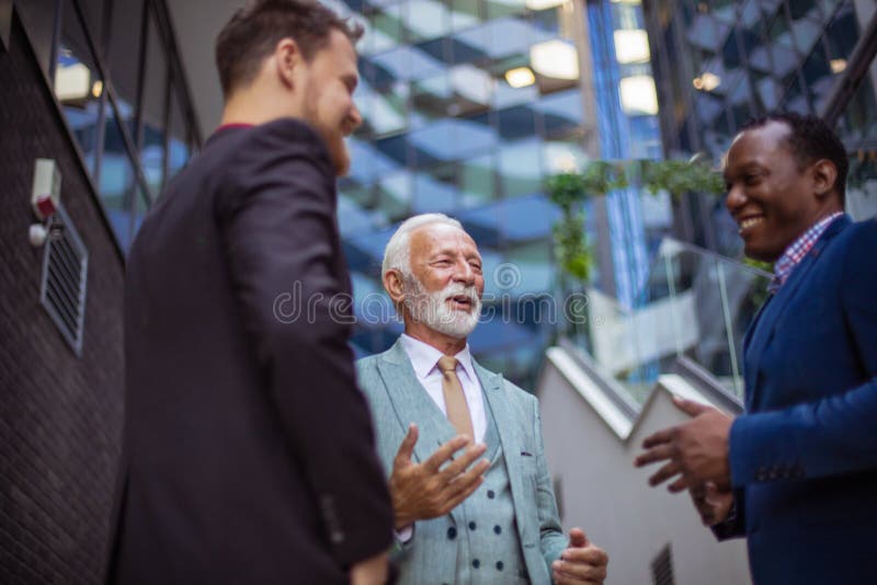 Three business men talking stock image. Image of american - 222043183