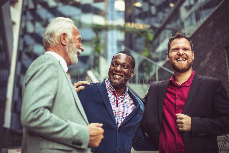 Two Business Men Talking on the Street Stock Photo - Image of males ...