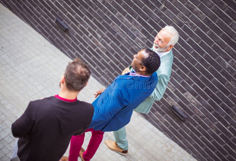 Three business men talking stock image. Image of american - 222043183