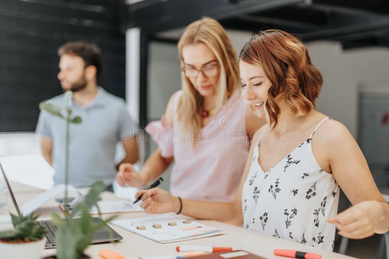 Three Business Partners Searching for a Solution To Their Problem Stock ...