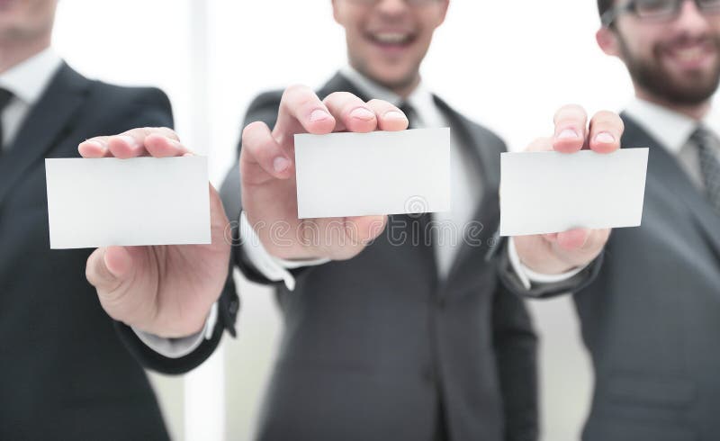 Three Business Partners Showing Their Business Card Form Stock Photo ...