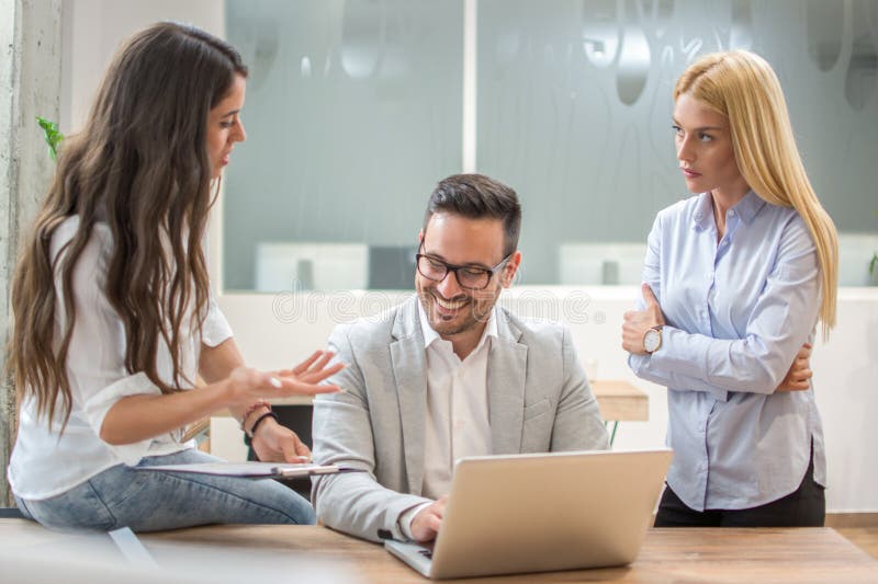 Three Business People Having Meeting in Office. Stock Image - Image of ...