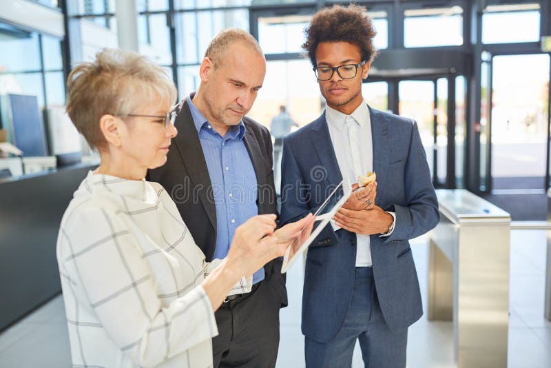 Three Business People are Planning Business Website Stock Photo - Image ...